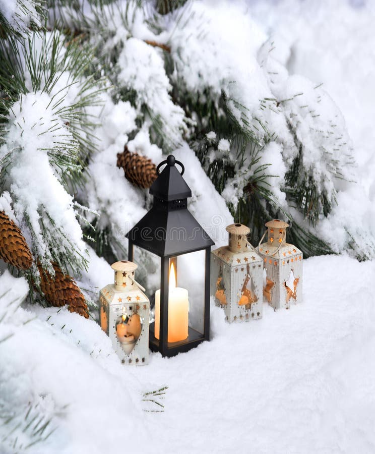 Lanterns in the Snow Under the Christmas Tree Stock Photo - Image of ...