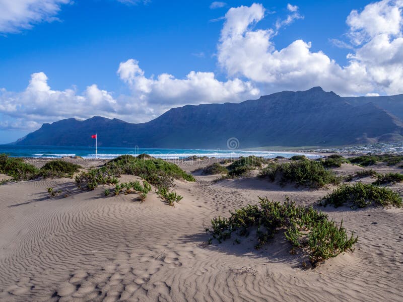 Lanzarote - Famara beach stock photo. Image of sand, travel - 97693216
