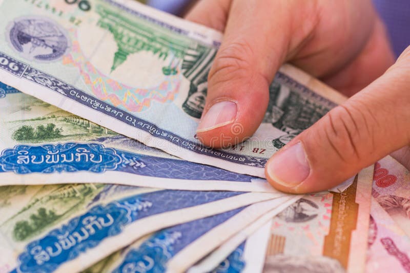Lao Banknotes stock photo. Image of money, hands, asia - 40742024