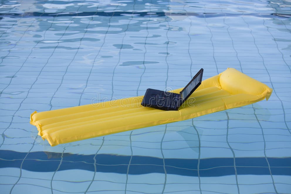 Laptop on air mattress stock image. Image of orange, pool - 11134453