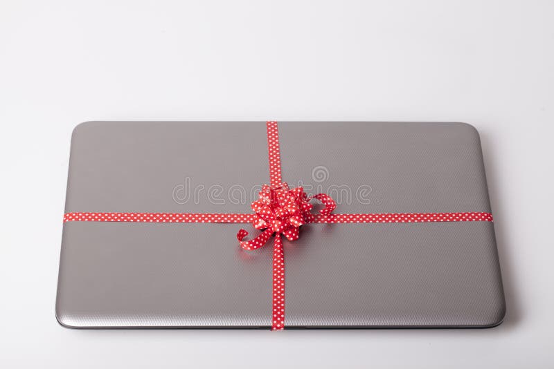 Laptop as a gift stock image. Image of isolated, ribbon - 85184855