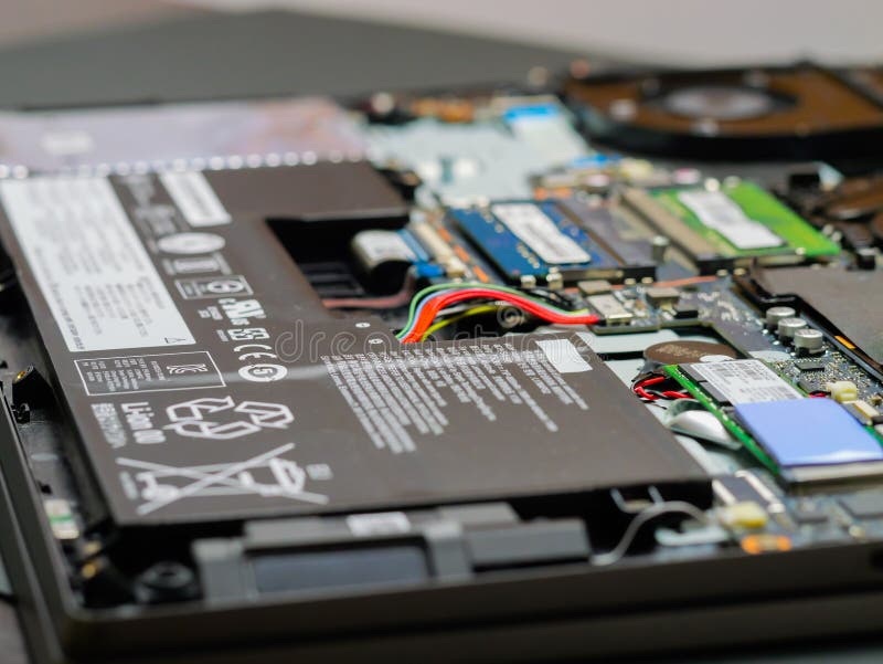 Battery or Plug Socket with Businessman Looking in Opposite Directions ...