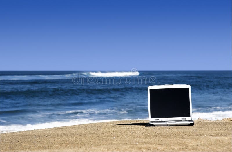 Laptop on the beach stock photo. Image of design, computer - 5145338