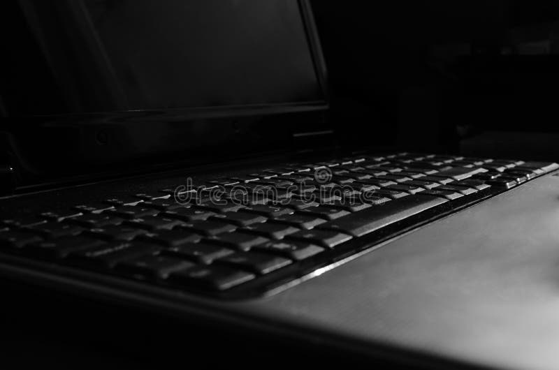 Laptop in black and white stock photo. Image of caps - 73553948