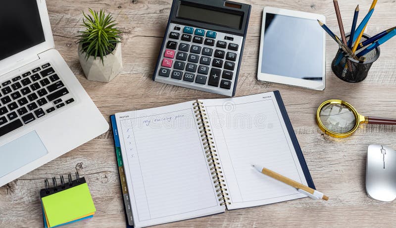 Laptop, Blank Notepad, Pen Calculator, Reminder Flower on Office Table ...