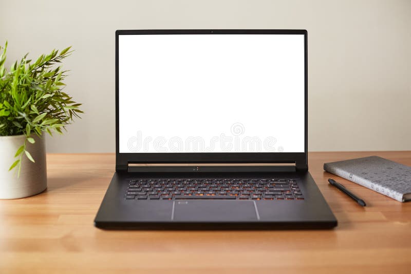Laptop with Blank Screen on Work Wooden Table Stock Photo - Image of ...