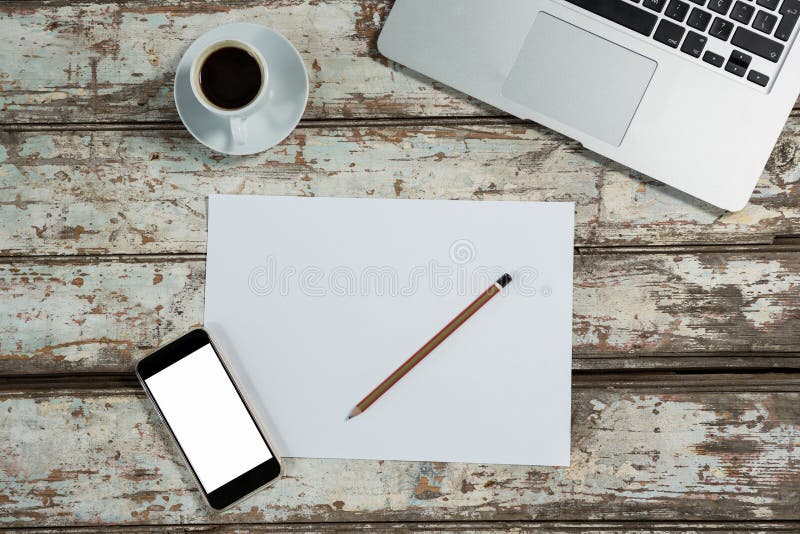 Laptop, Blank Sheet of Paper, Smartphone and Coffee Cup Stock Photo ...