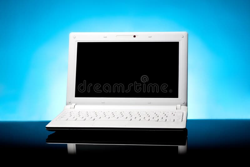 Laptop on blue stock image. Image of laptop, light, nternet - 23628827