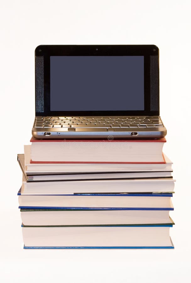 Laptop on books stock image. Image of info, library, information - 7913511