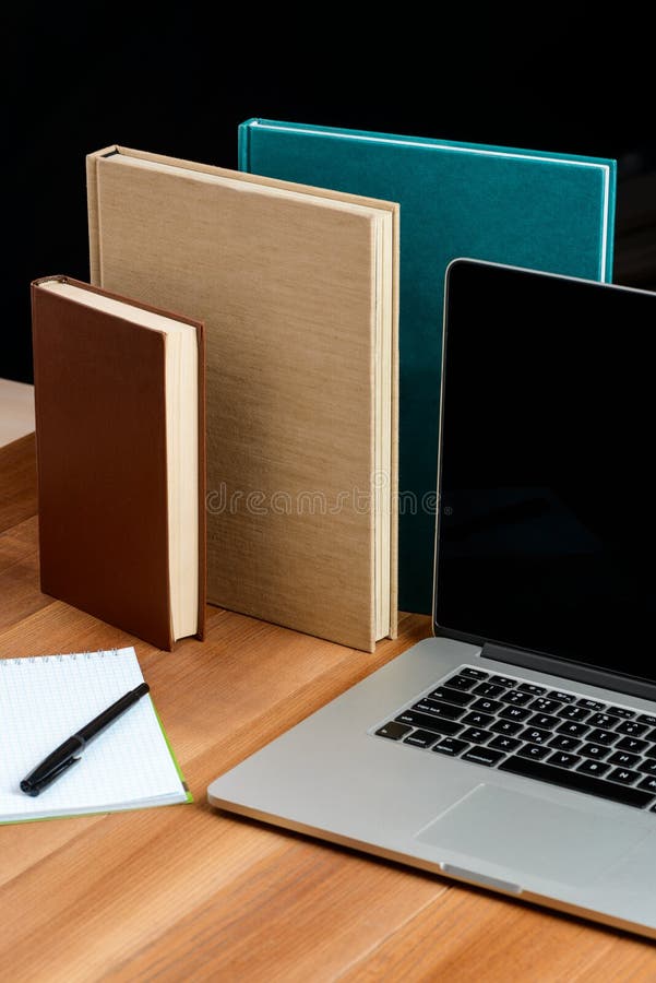 Laptop and Books on Table. Working in a Library Stock Image - Image of ...
