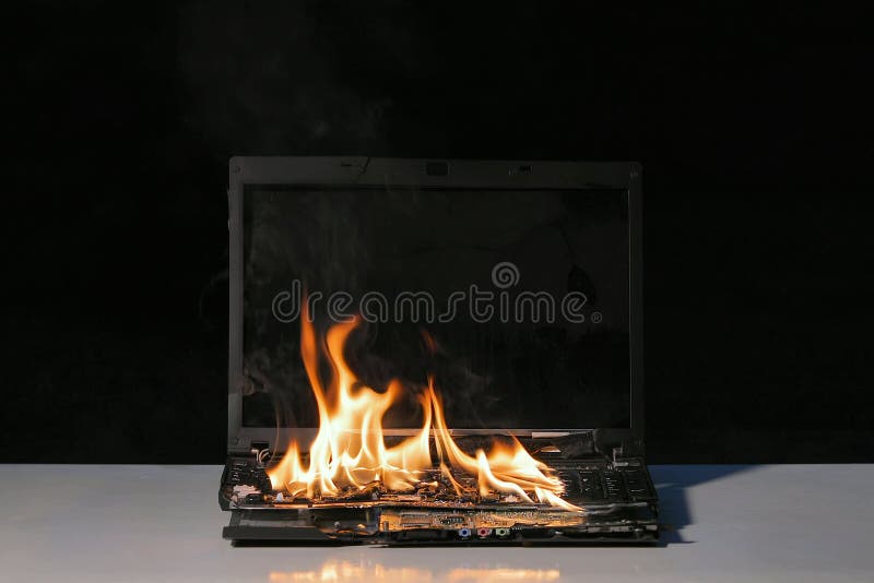 Burning laptop computer stock photo. Image of loss, frying - 219029142