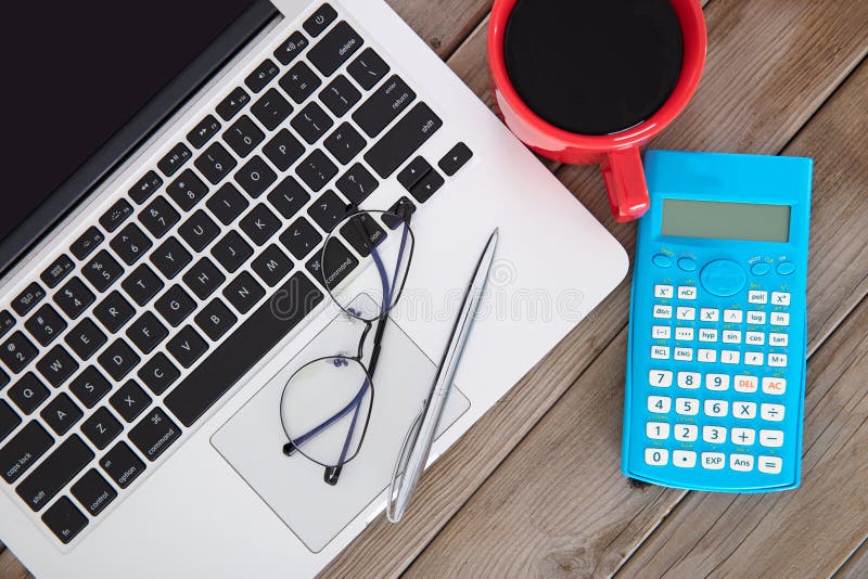 Laptop and Calculator and a Cup of Coffee Editorial Photography - Image ...