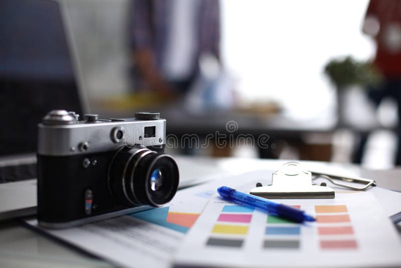 Laptop and Camera on the Desk with Folder Stock Photo - Image of laptop ...
