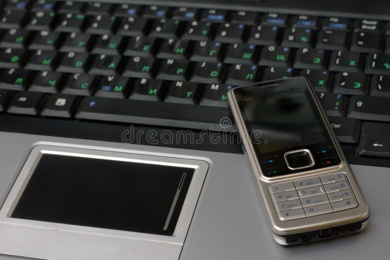 Laptop and Silver Smart Phone Stock Image - Image of communication ...