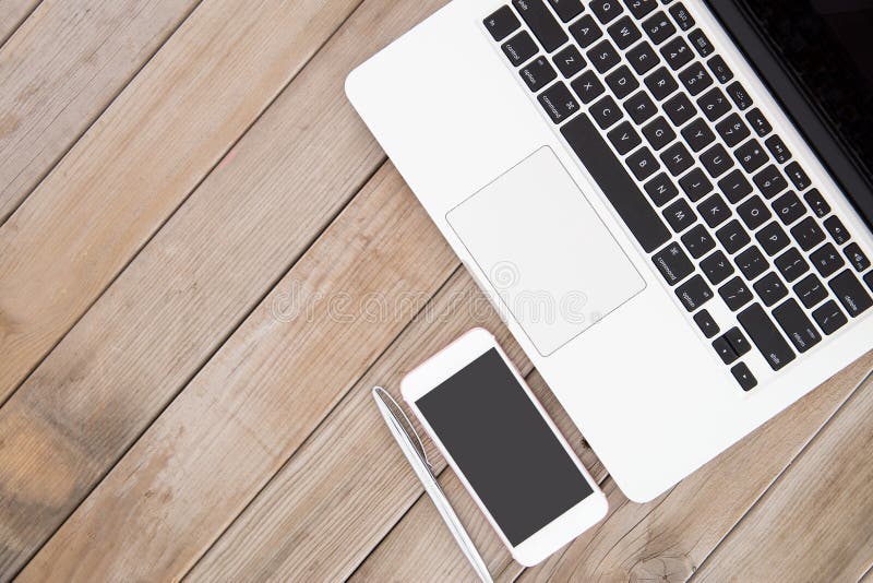 A Laptop and a cell phone editorial stock image. Image of keyboard ...