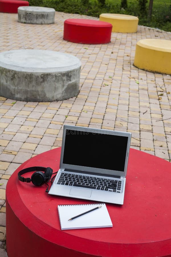 Laptop on the Cement Table. Stock Photo - Image of concept, outdoors ...