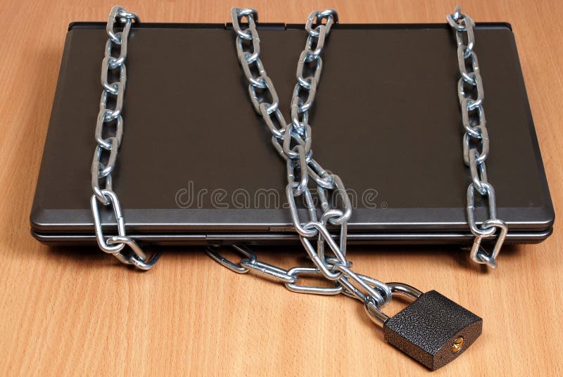 Laptop in the chain stock photo. Image of theft, lock - 64577622