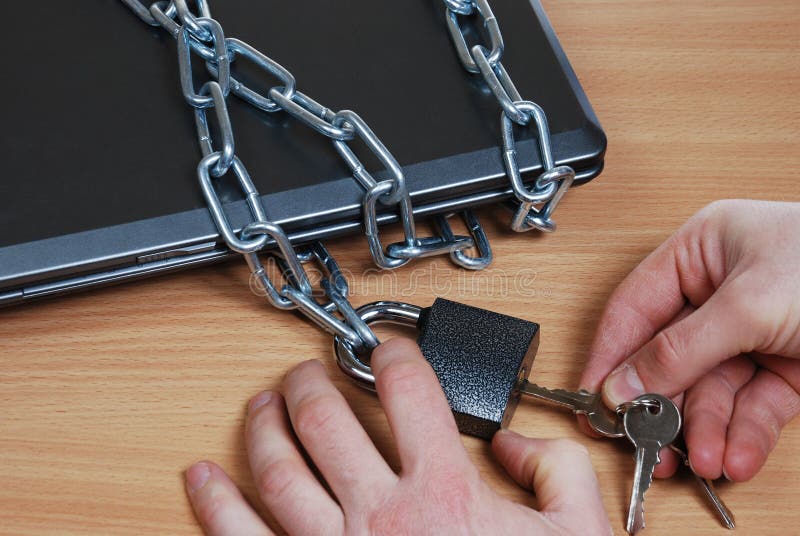 Laptop in the chain stock image. Image of concepts, stealing - 64577615