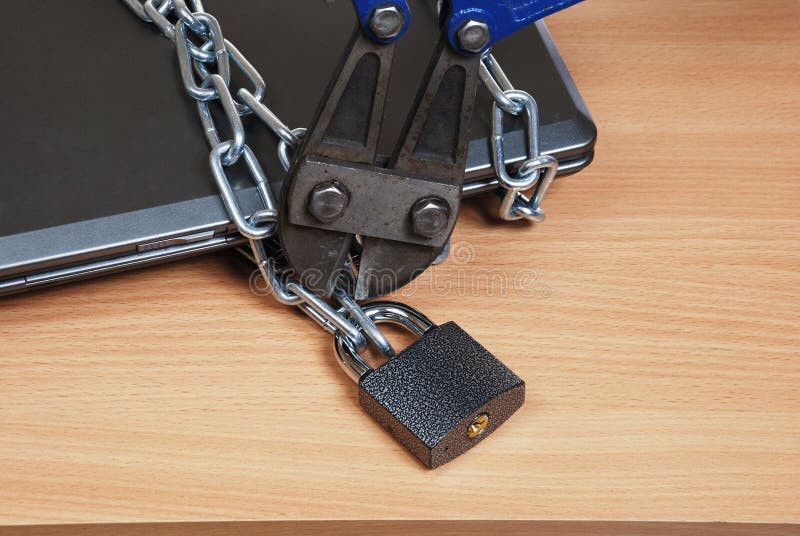 Laptop in the chain stock image. Image of reliability - 64577641