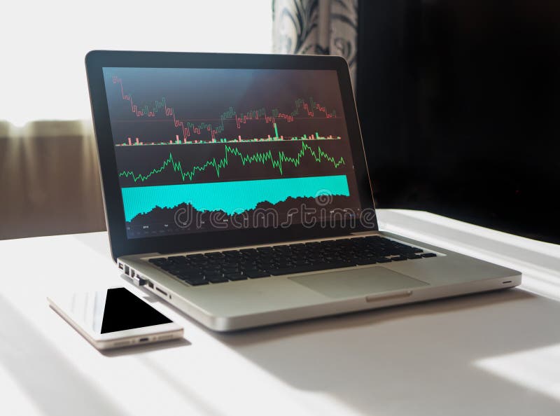 Laptop with Chart on Its Display at Workplace of Economist Stock Photo ...