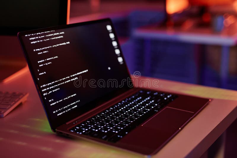 Laptop with Coded Data on Screen Standing on Desk Stock Photo - Image ...