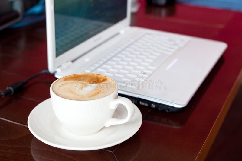 Laptop and coffee stock photo. Image of modern, drink - 27430734