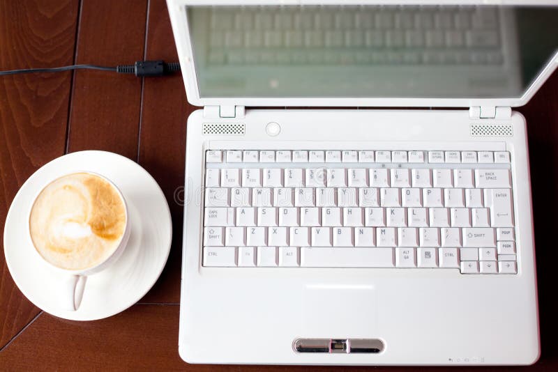 Laptop and coffee stock image. Image of foam, keyboard - 27431025