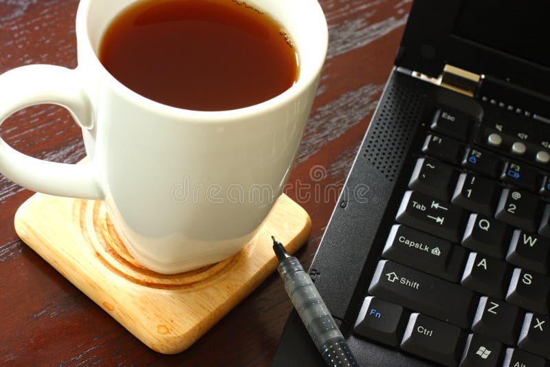 Laptop and Coffee stock image. Image of glass, sitting - 6636901