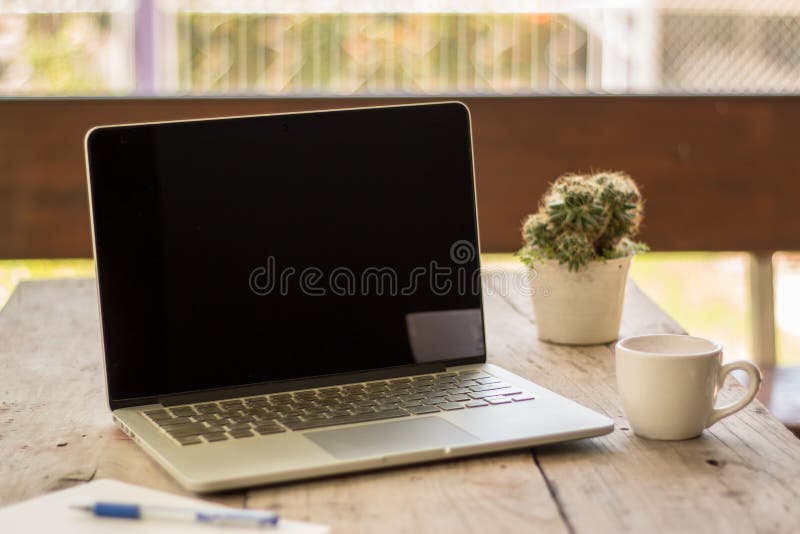 Laptop and coffee stock photo. Image of office, macbook - 73136432