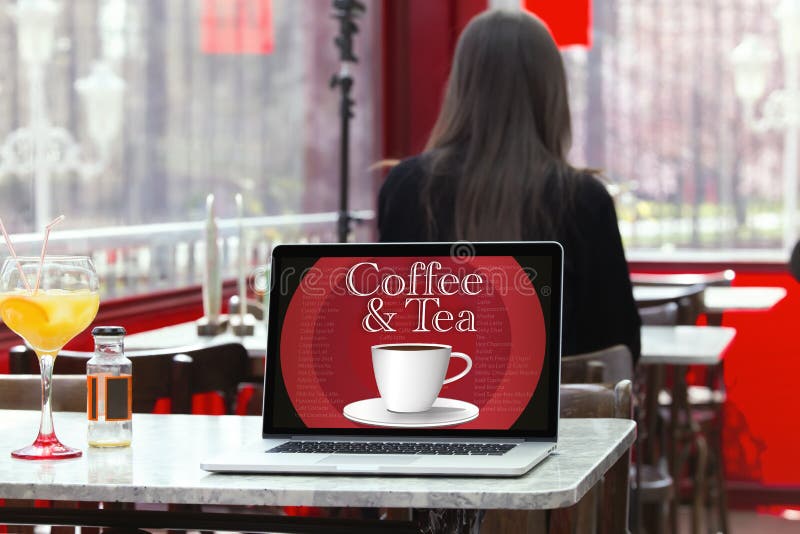 Laptop in a Coffee Shop with Coffee Menu on the Screen and a Cus Stock ...