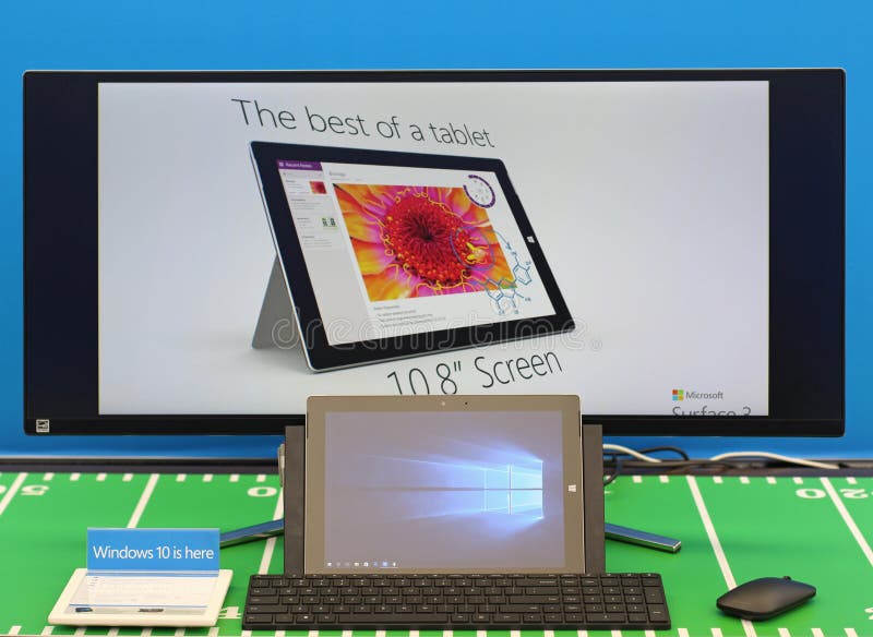 Laptop Computer and Big Screen with Windows 10 Editorial Photography ...