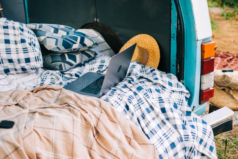 Laptop Computer on a Blanket in the Van, Cozy Workplace Outdoor Stock ...