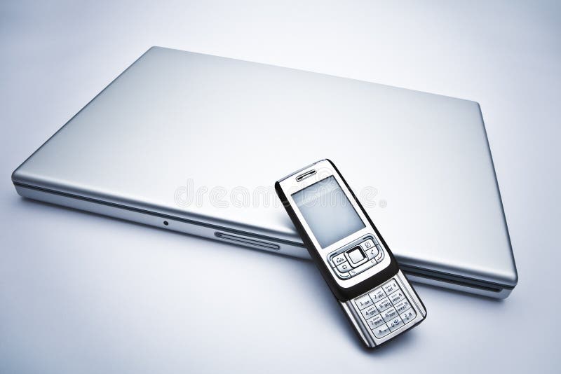 Laptop Computer with Cell Phone Stock Photo - Image of open, phone: 4446284