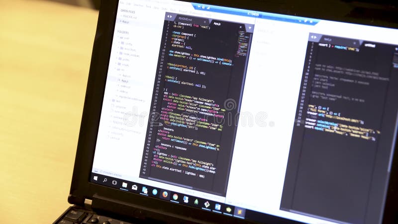 Laptop with Computer Code. Software Development. Software Source Code ... Laptop with Computer Code. Software Development. Software Source Code ...