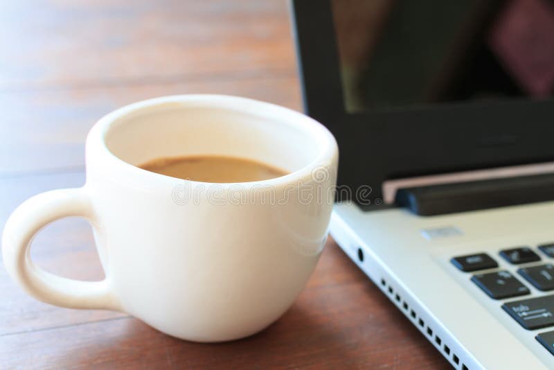 Laptop computer and coffee stock photo. Image of line - 49483948