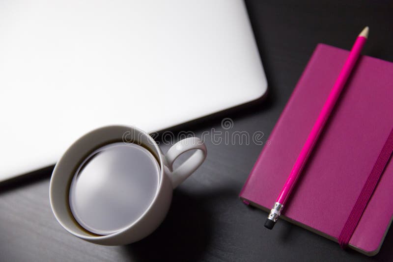 Laptop Computer Coffee and Notebook on Black Office Desk Stock Image ...