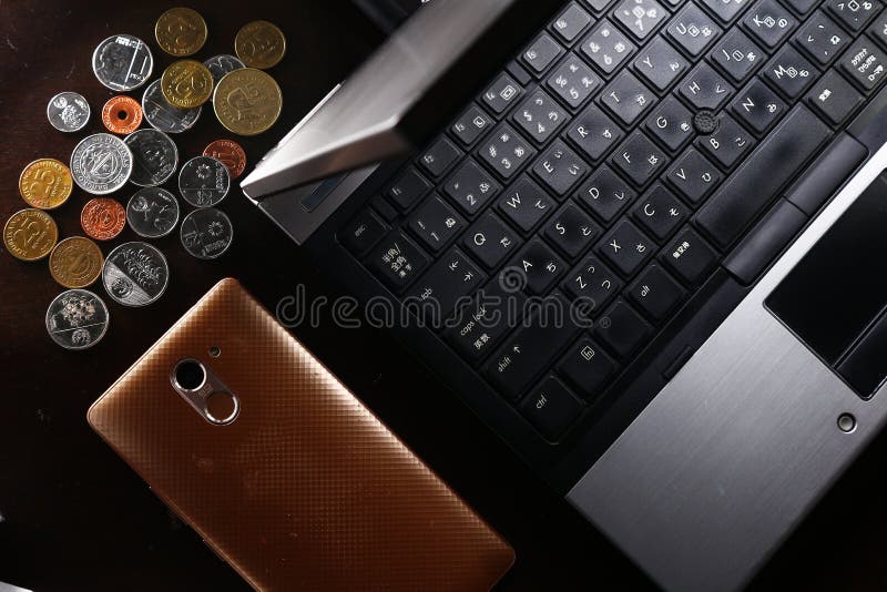 Laptop Computer, Coins and a Smartphone Stock Photo - Image of save ...