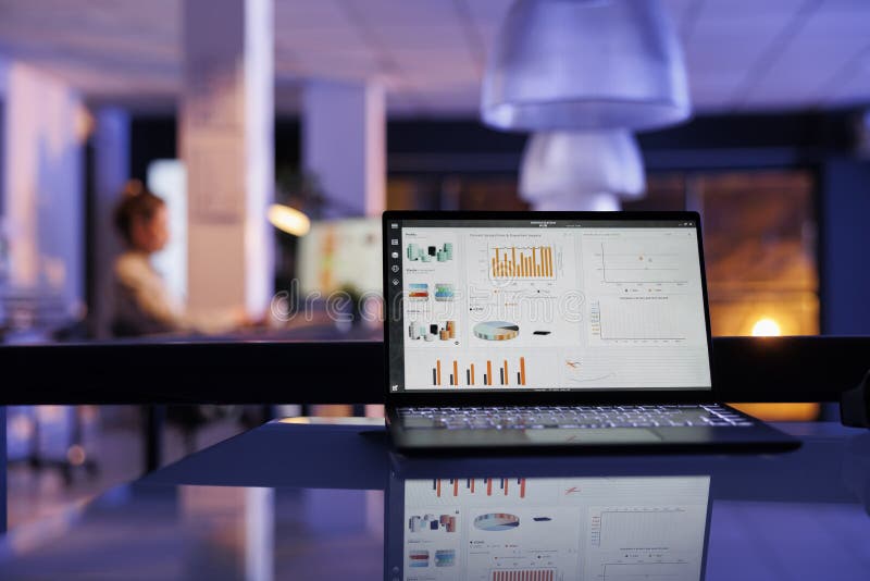 Laptop Computer Showing Marketing Statistics on Screen Stock Photo ...