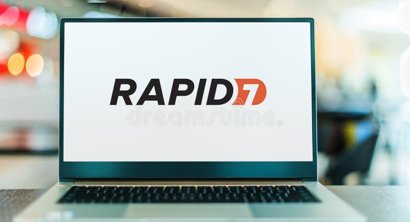 Laptop Computer Displaying Logo of Rapid7 Editorial Stock Photo - Image ...
