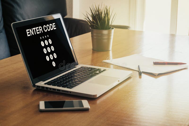 Laptop Computer with ENTER CODE Page in the Screen at the Office Stock ...