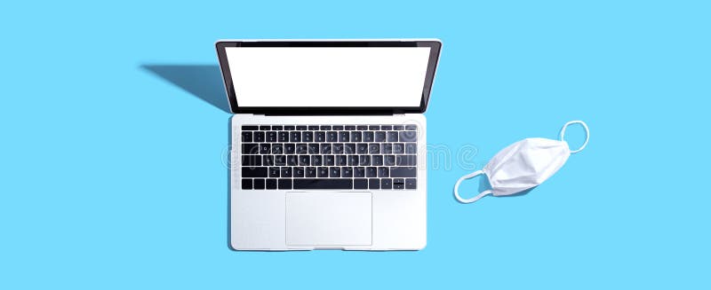 Laptop Computer with a Facial Mask Stock Image - Image of office, mask ...