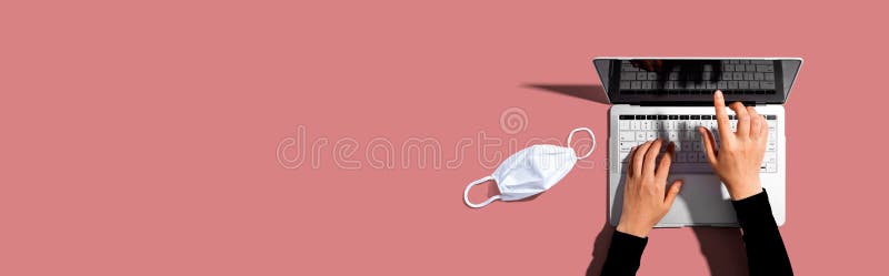 Laptop Computer with a Facial Mask Stock Image - Image of work, remote ...