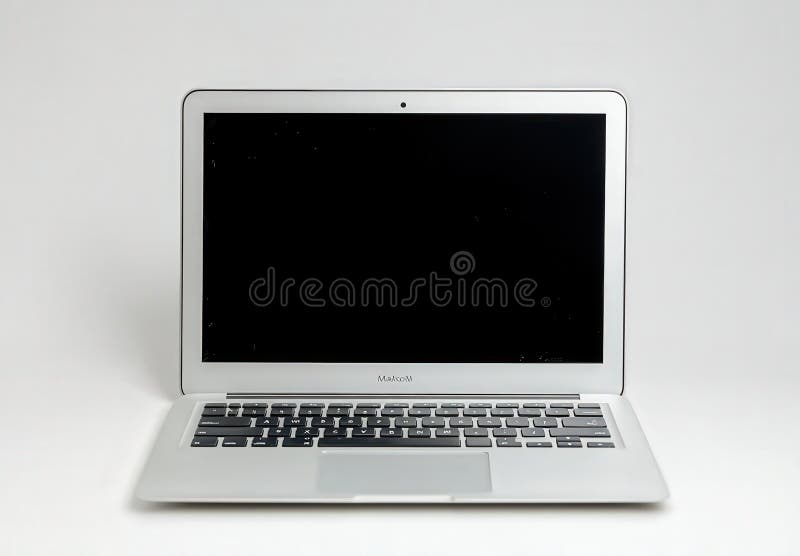 A Laptop Computer Featuring a Bright White Screen and a Black Keyboard ...