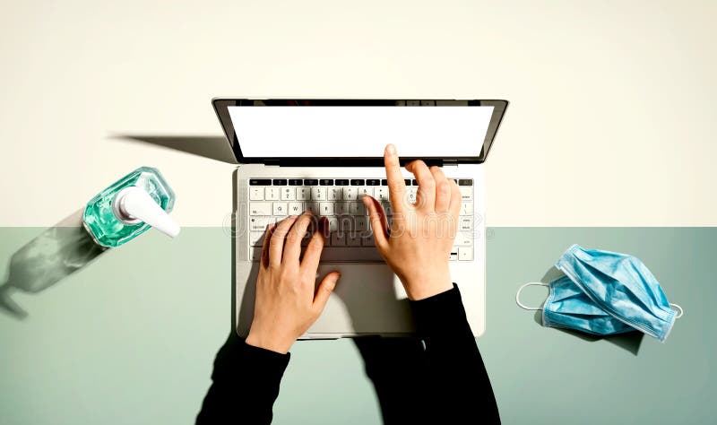 Laptop Computer with Hand Sanitizer and Masks Stock Image - Image of ...
