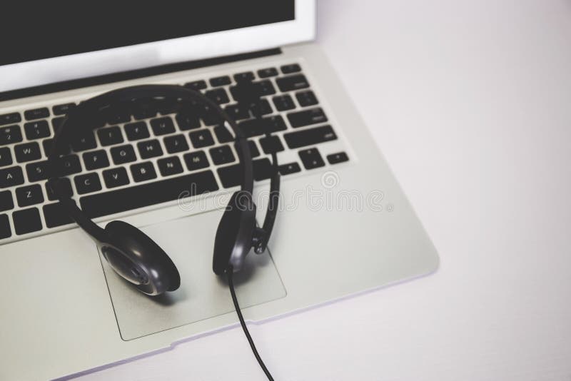 Laptop Computer and Headphone on Desk, E-learning Online, Webinar for ...