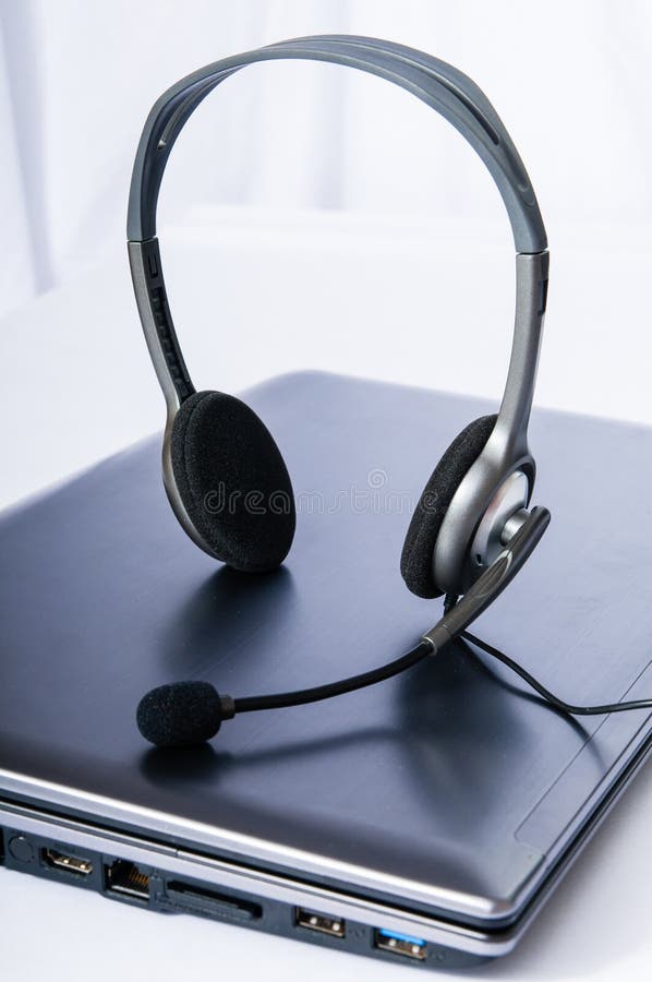 Laptop Computer with Headset Stock Image - Image of desk, laptop: 25949041
