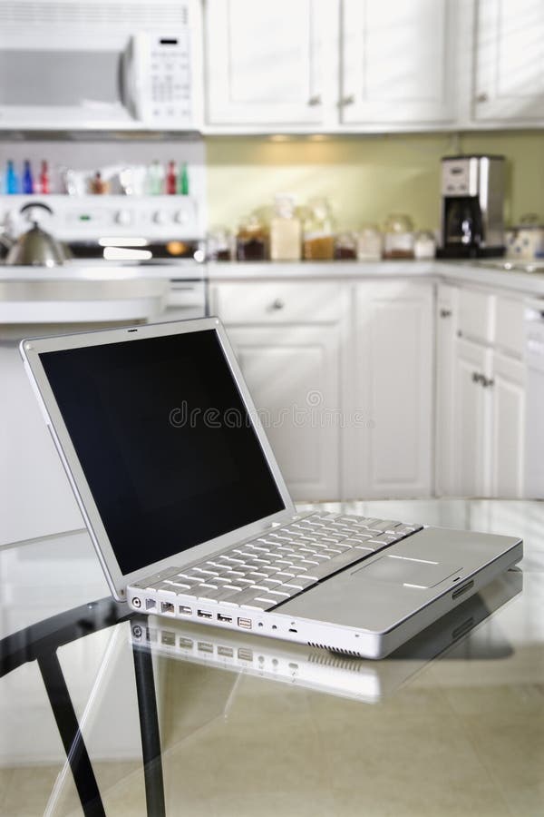 Laptop Computer on Kitchen. Stock Photo - Image of ethnic, indoors: 2044974