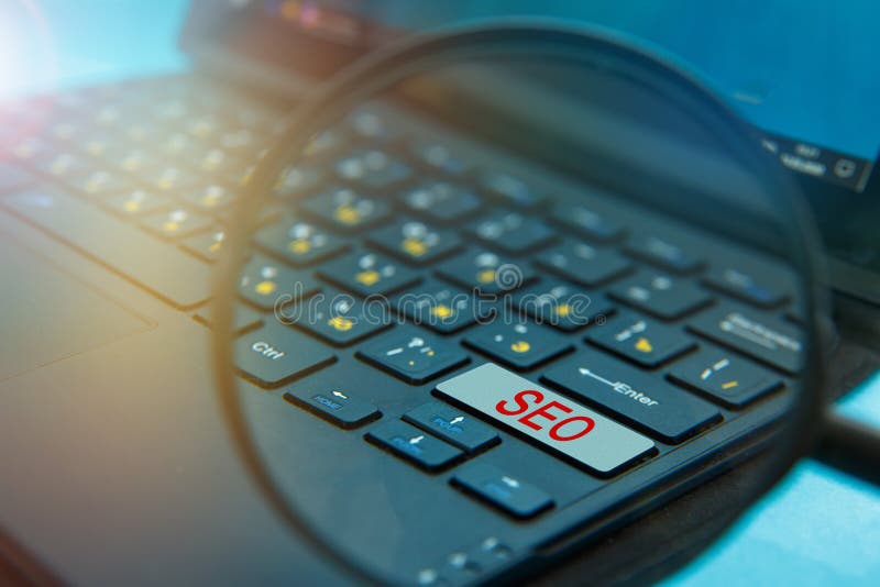 Laptop Computer with Magnifying Glass Stock Photo - Image of help ...