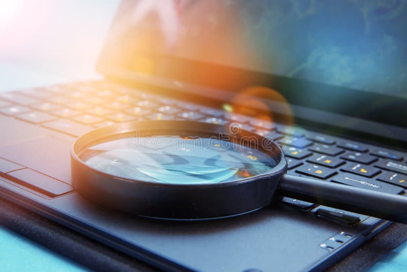 Laptop Computer with Magnifying Glass Stock Photo - Image of concepts ...