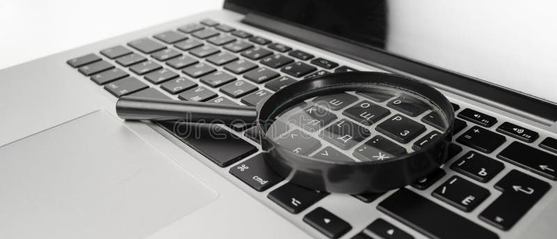 Laptop Computer with Magnifying Glass, Concept of Search Editorial ...